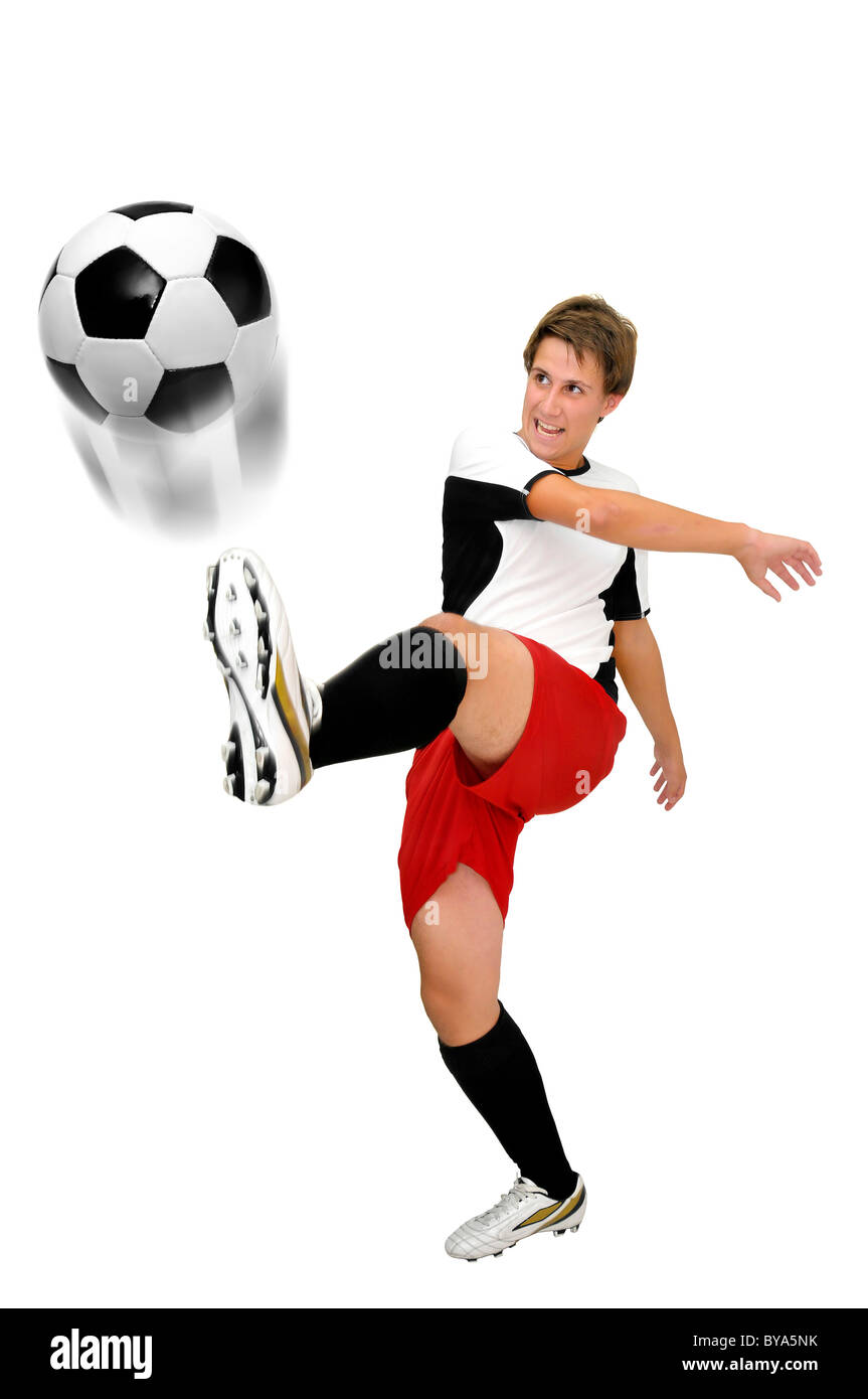 Young football player with a ball isolated in white Stock Photo - Alamy