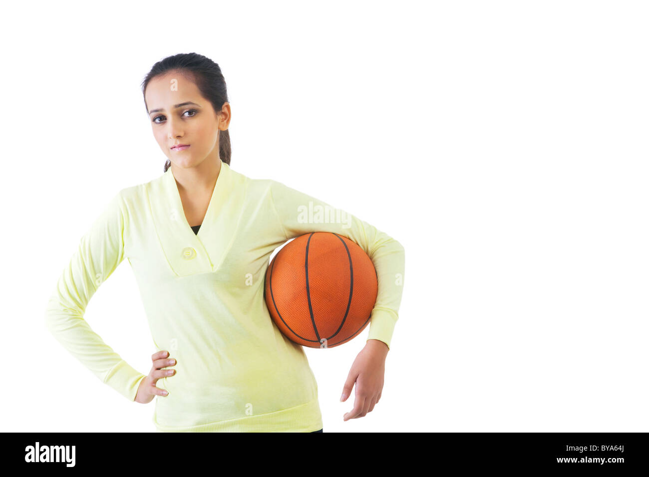 Portrait of a girl with a basketball Stock Photo - Alamy
