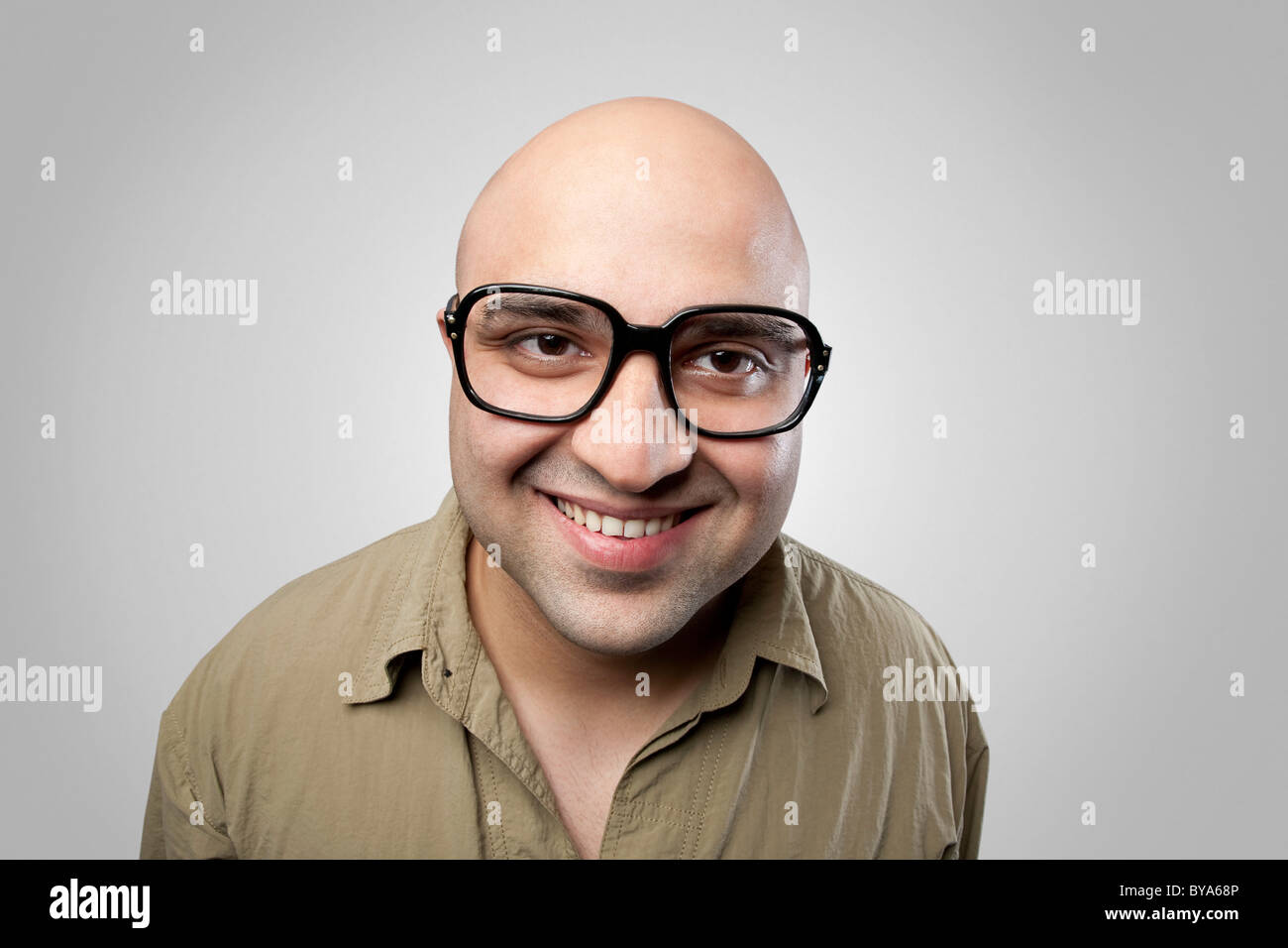 Bald man smiling Stock Photo - Alamy