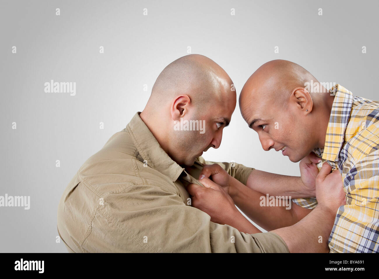 Bald men fighting Stock Photo - Alamy