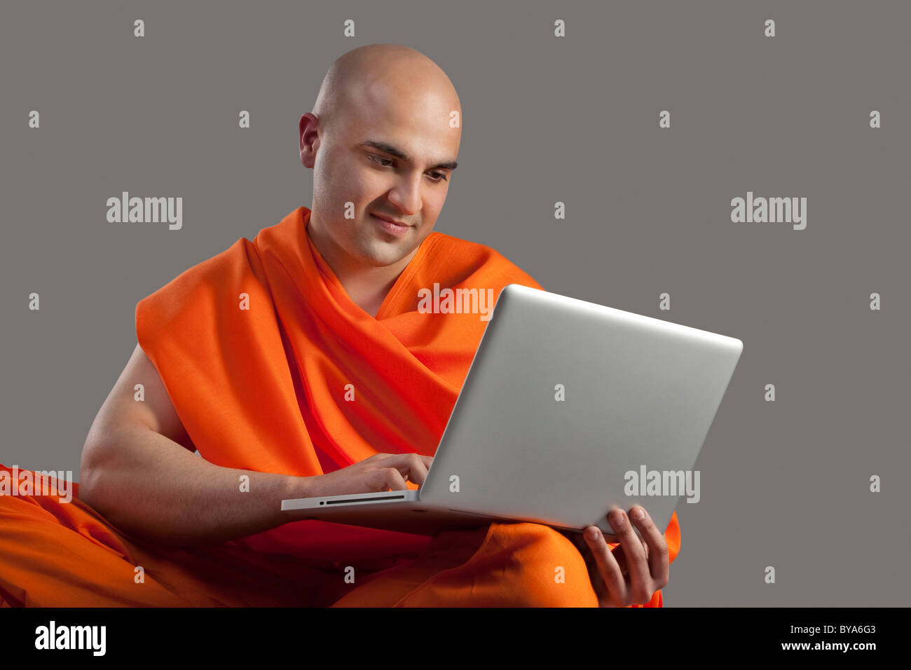 Happy monk smiling monk hi-res stock photography and images - Alamy