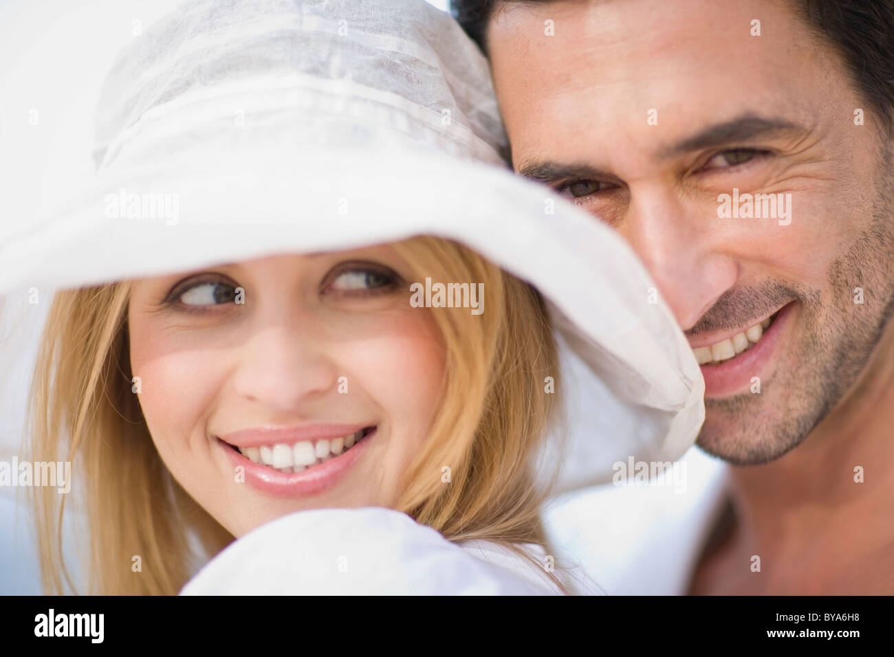Couple in white Stock Photo - Alamy