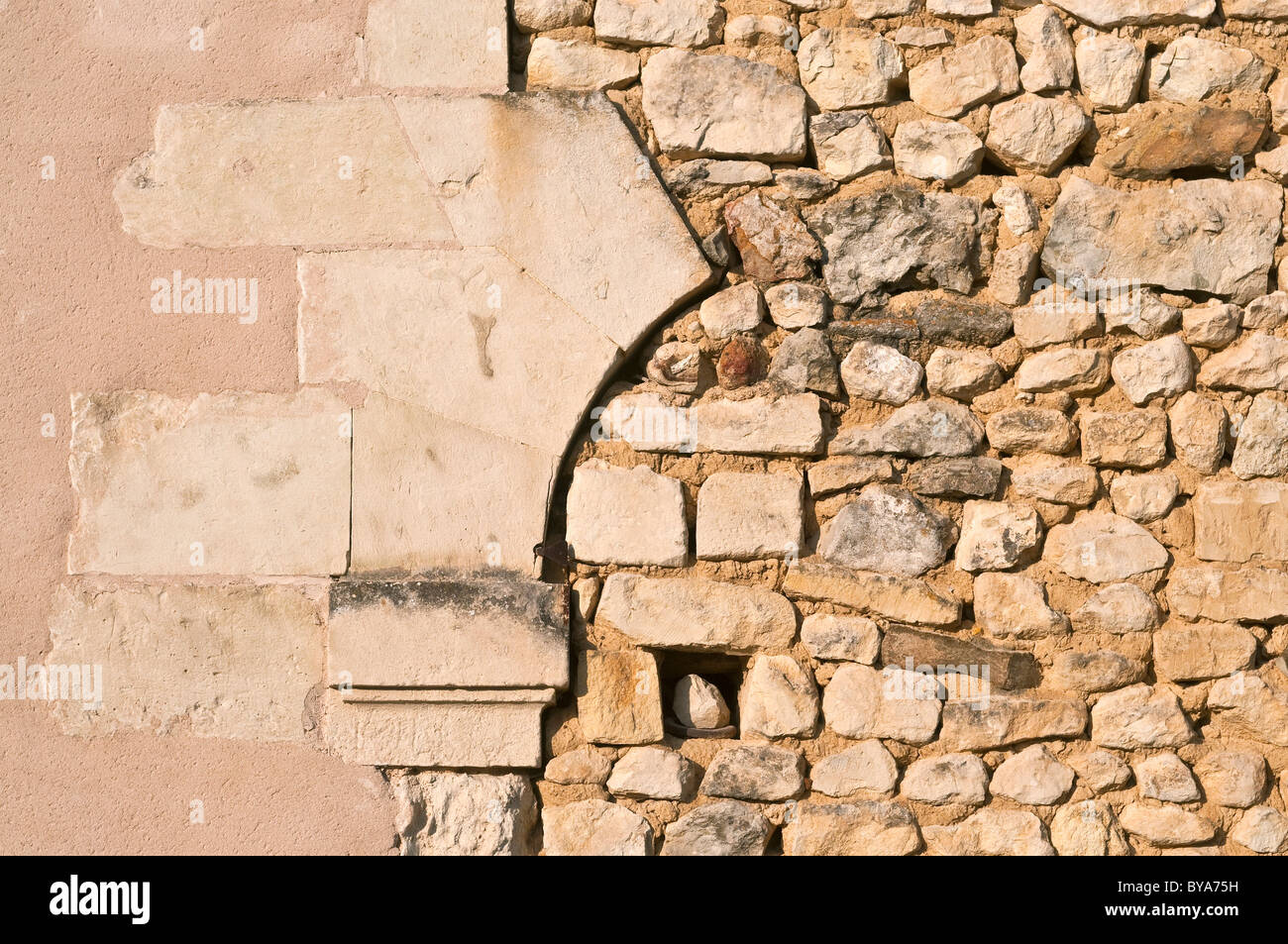 Old random stone in-fill to collapsed arched entrance - France Stock ...