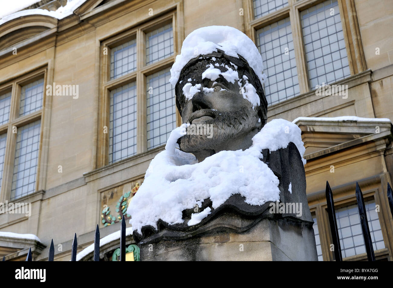 Snow covered statue outside Museum of the History of Science, Oxford ...