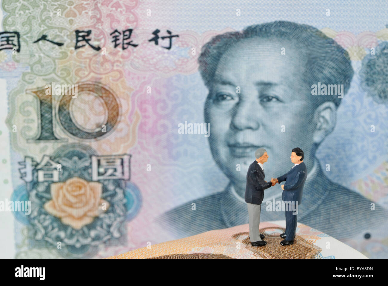 Manager figurines on Chinese yuan, renminbi or Yuán Kuài, currency of ...
