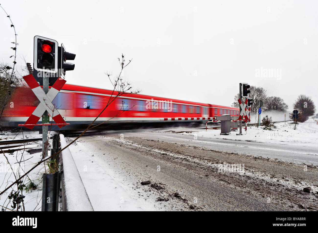 Railway crossing gates train germany High Resolution Stock Photography ...
