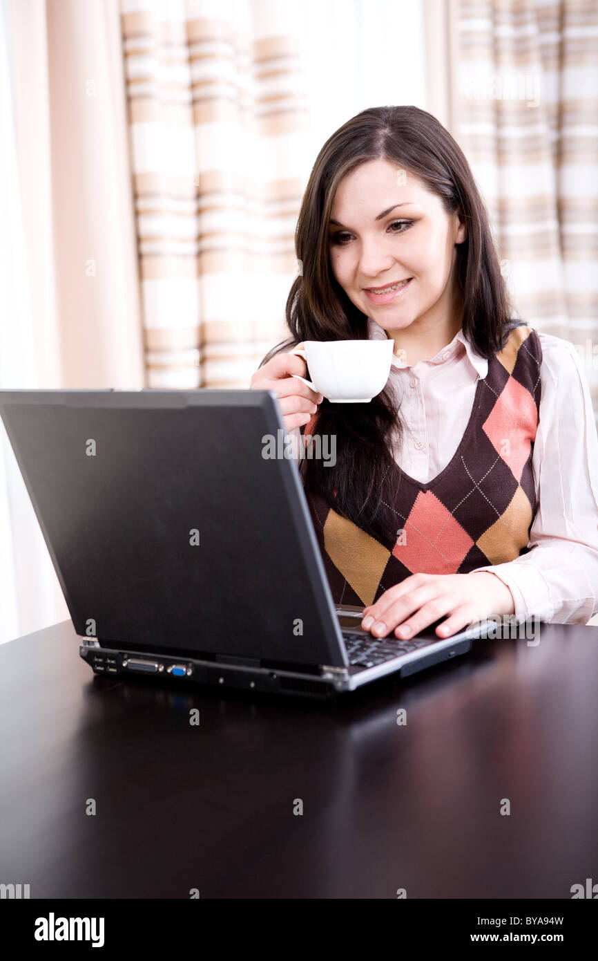 young adult brunette woman with laptop Stock Photo - Alamy young adult brunette woman with laptop Stock Photo - Alamy