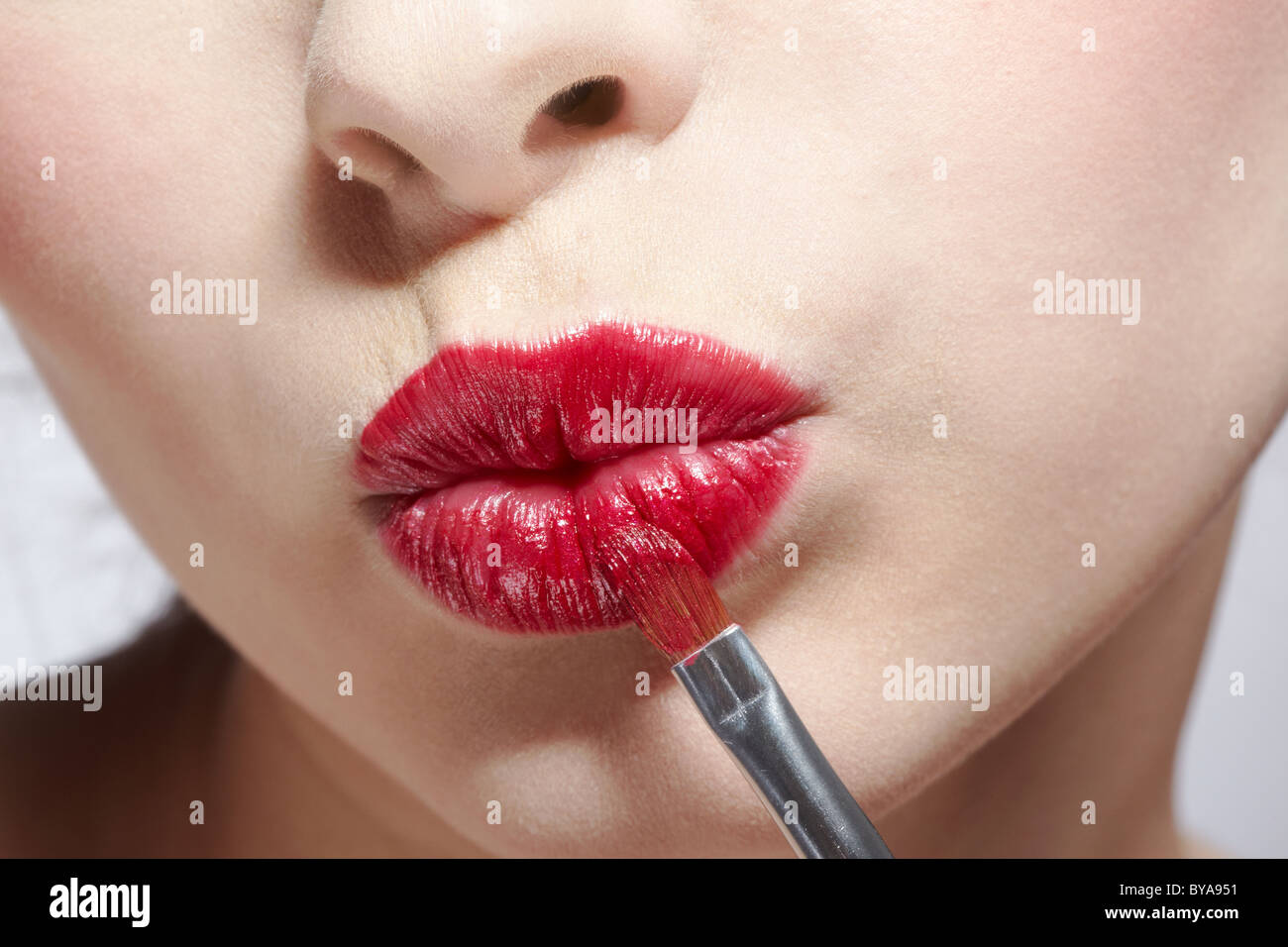 girl's lips zone makeup Stock Photo - Alamy