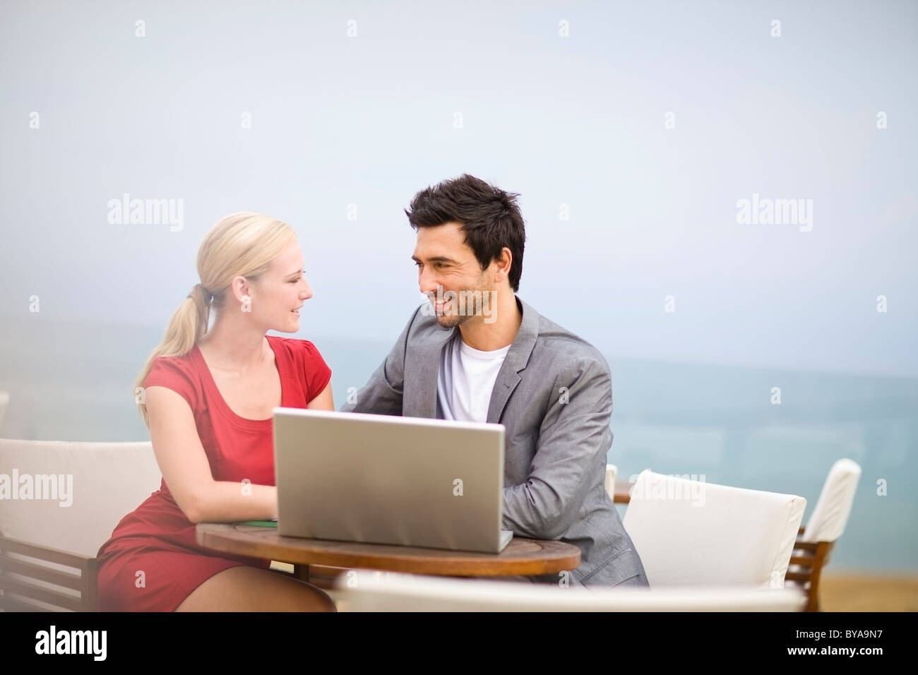 Couple worker using face hi-res stock photography and images - Alamy
