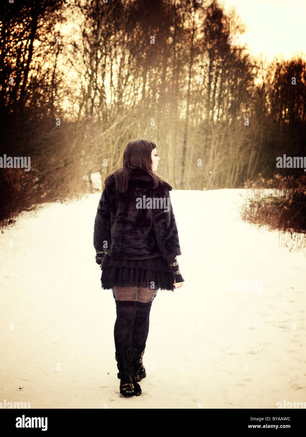 Woman with coat walking from behind hi-res stock photography and images ...