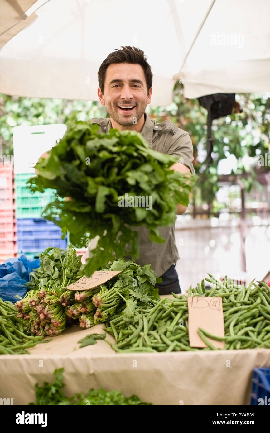 Man selling vegetables Stock Photo - Alamy