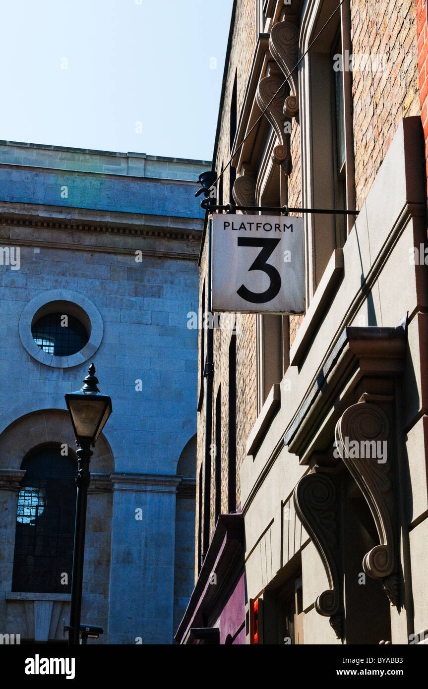 View of historical buildings and station platform sign Stock Photo - Alamy