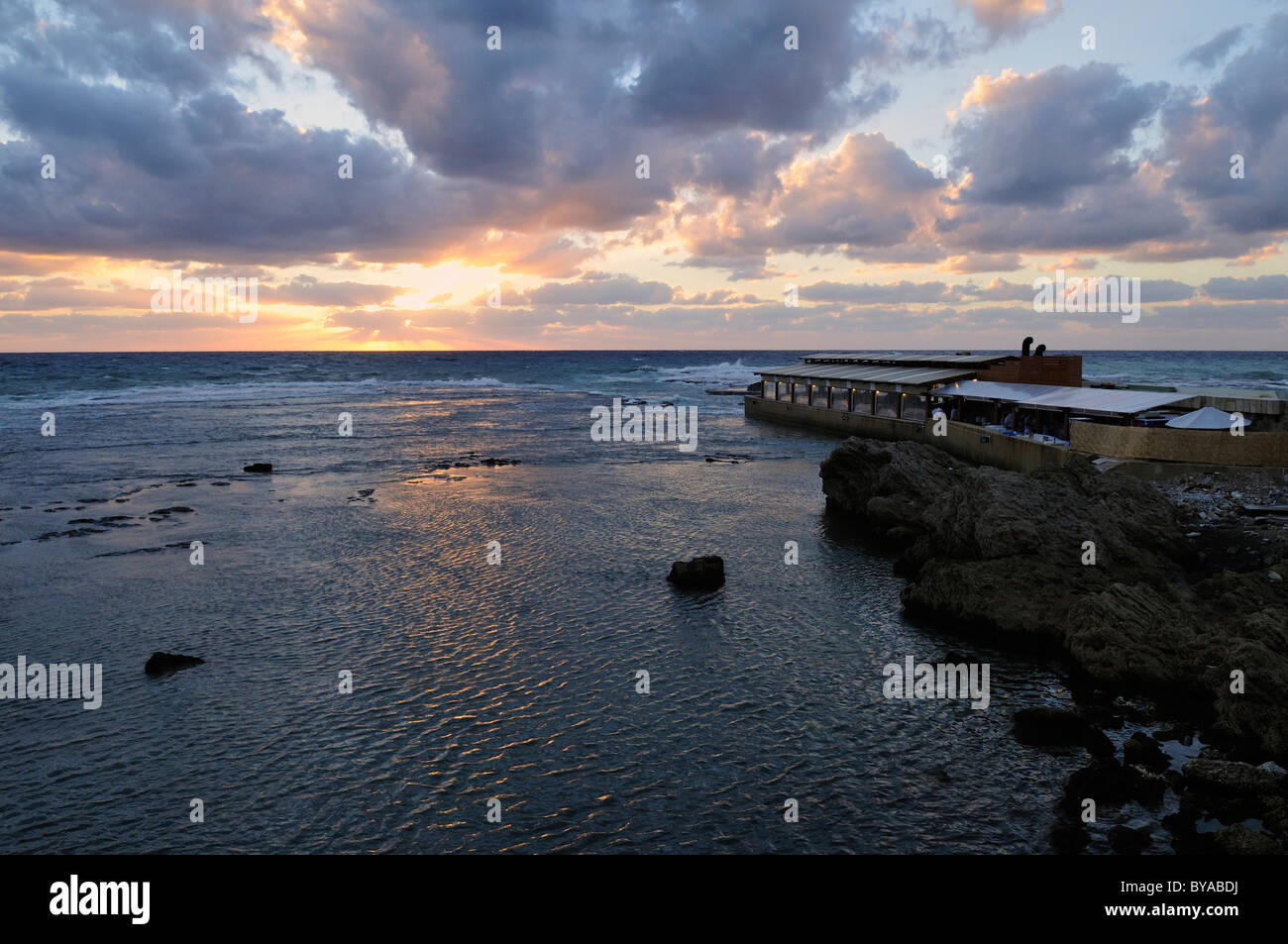 Sunset on the mediterranean coast at Byblos, Unesco World Heritage Site ...