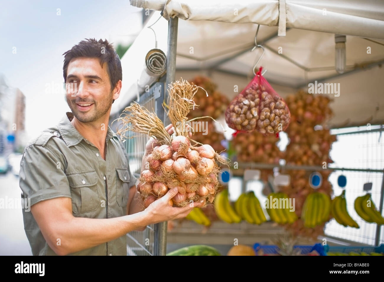 Man selling vegetables Stock Photo - Alamy