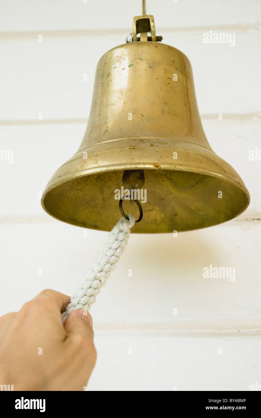 Man ringing a bell Stock Photo - Alamy