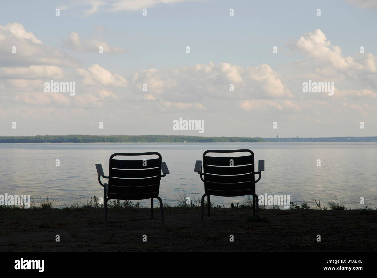 Two empty chairs by a lake, Sweden Stock Photo - Alamy