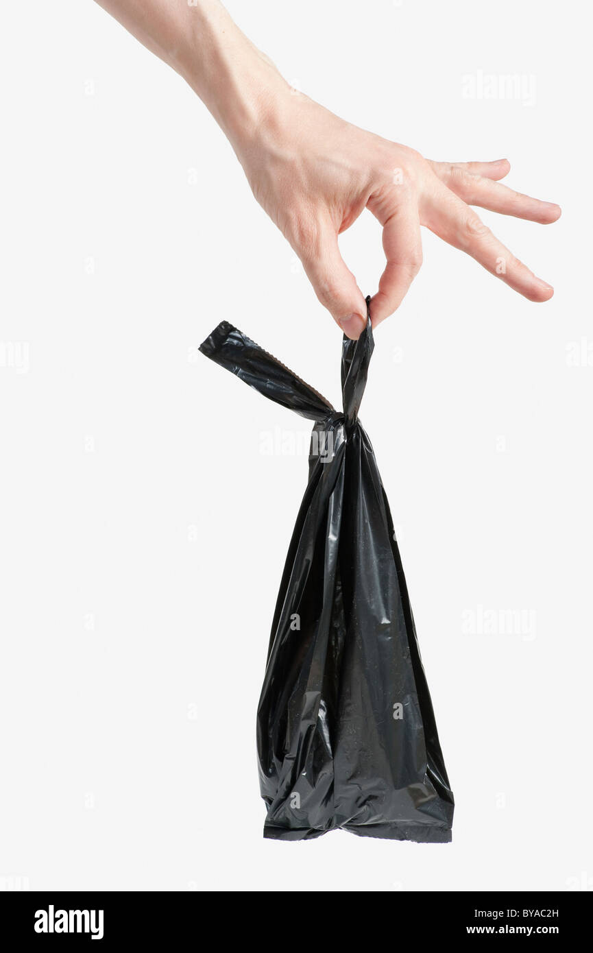 Hand holding plastic bag Cut Out Stock Images & Pictures - Alamy