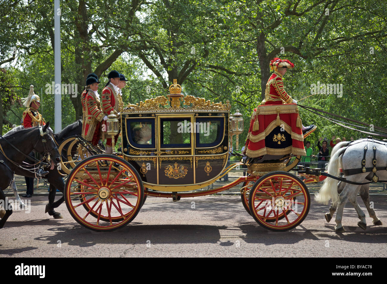The Royal coach with Queen Elizabeth 11 and Prince Phillip on the way ...