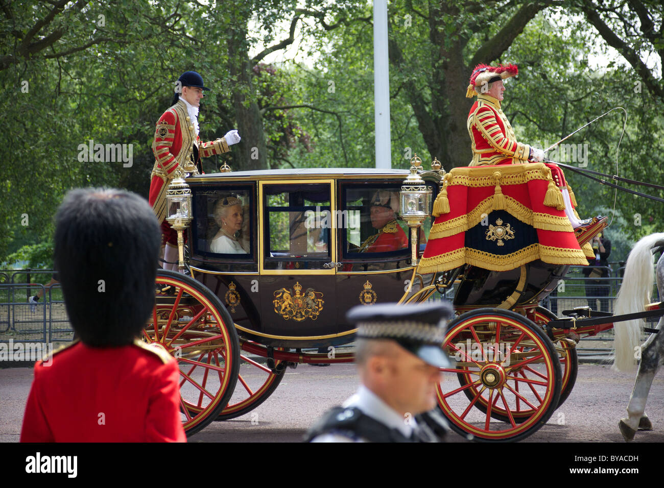 A Royal coach on the way way to the State opening of Parliament, London ...