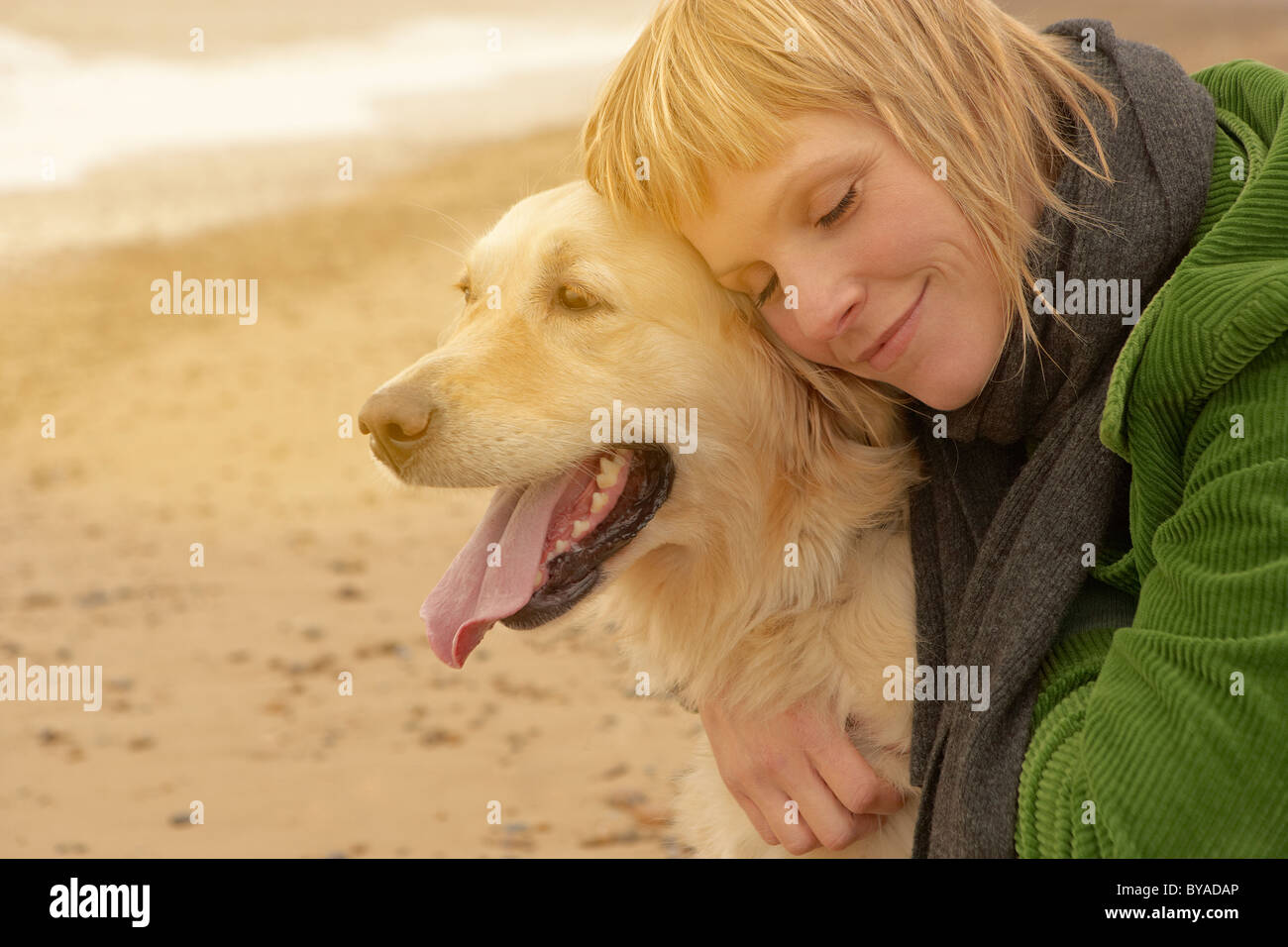 Woman dog on seashore hi-res stock photography and images - Alamy
