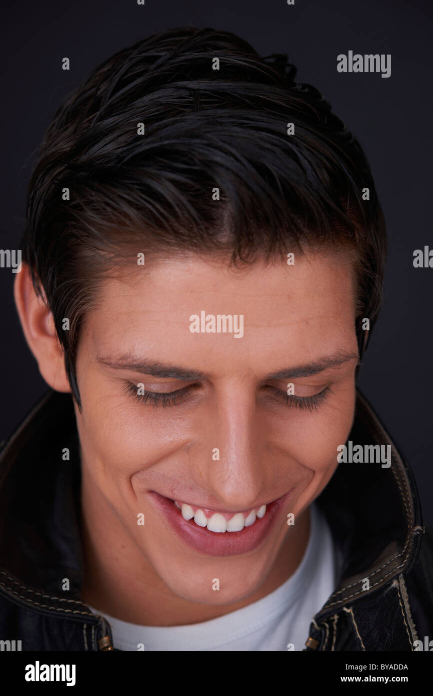 Young man with shiny white teeth, smiling, portrait Stock Photo - Alamy