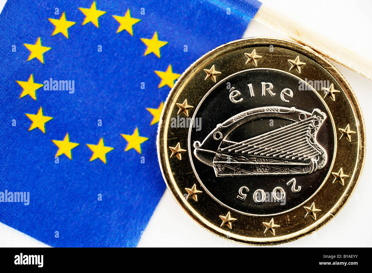 Irish one euro coin on the flag of the European Union, symbolic image ...