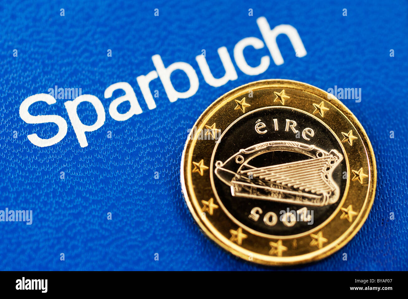 Irish euro coin one and savings book hi-res stock photography and ...