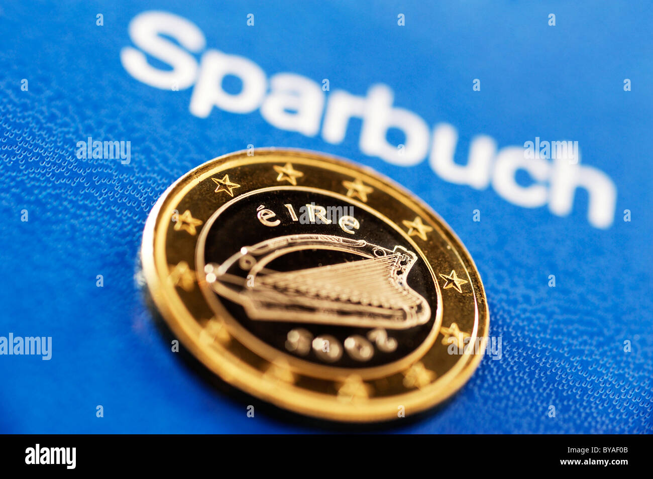 Irish euro coin one and savings book hi-res stock photography and ...