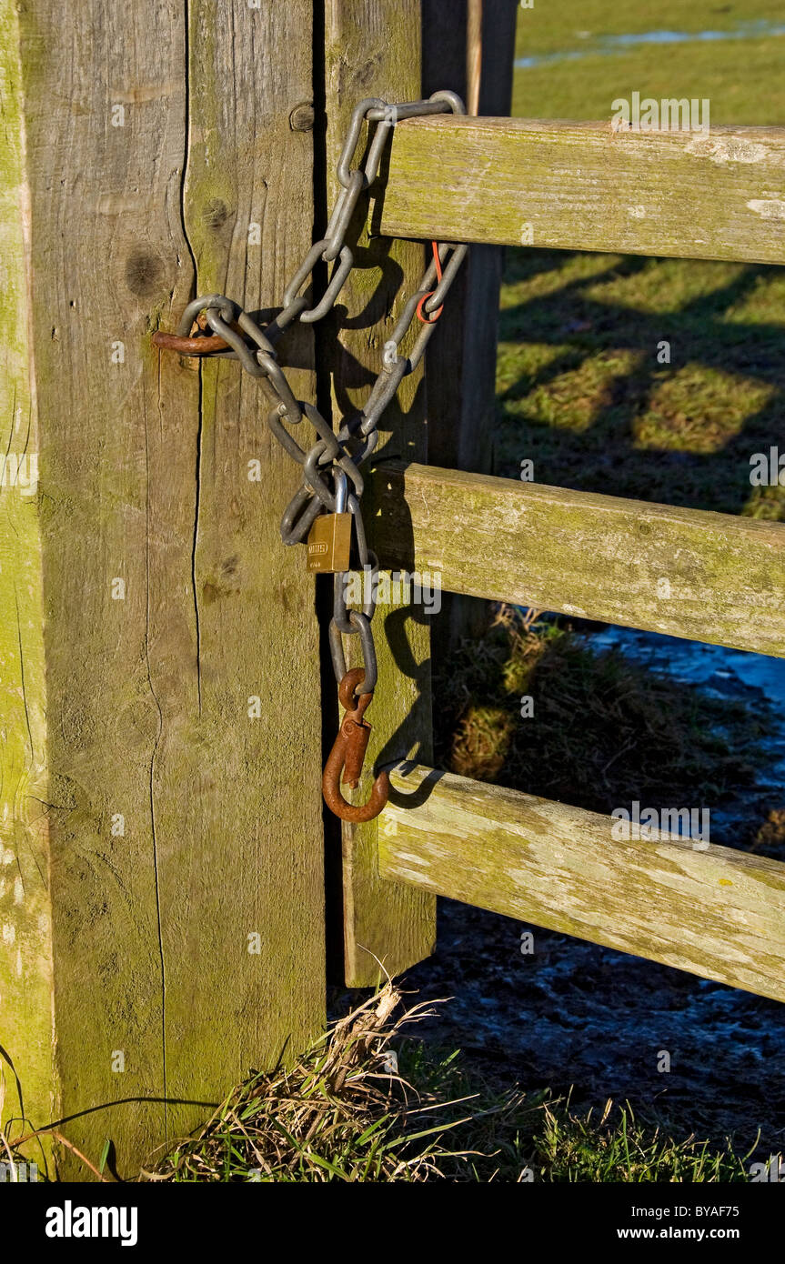 Access to a farmers field locked with padlock and chain chains attached ...