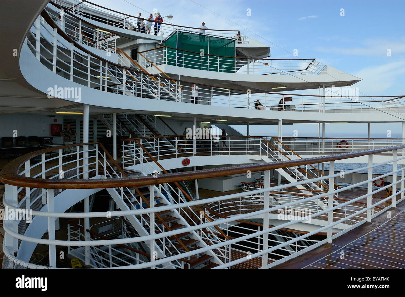 The relaxing stern decks of the cruise ship Artemis which provide ...