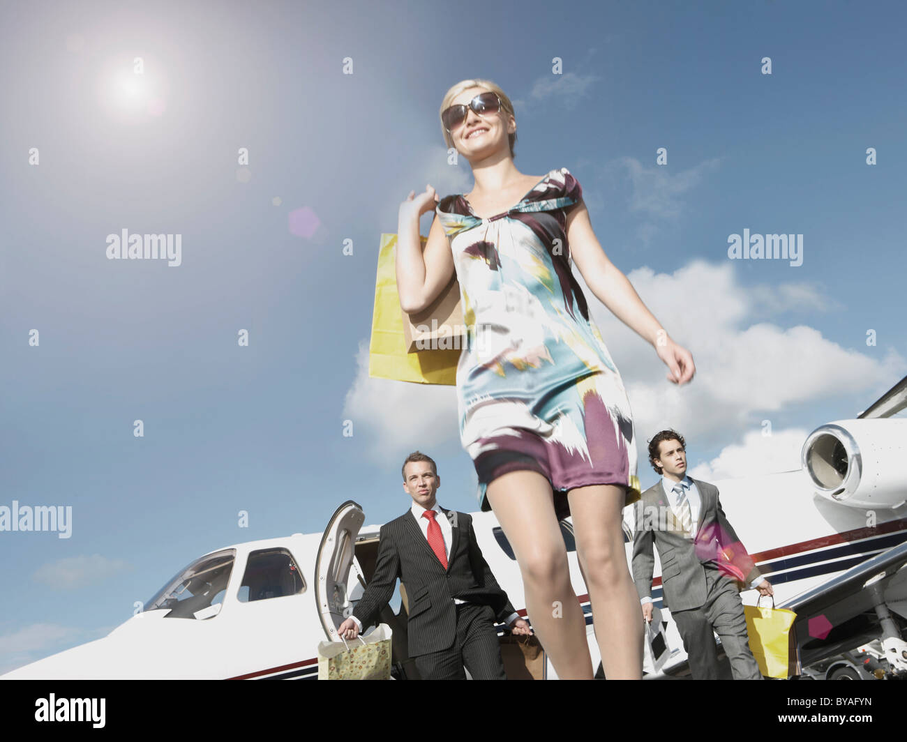 Rich woman traveling in private jet Stock Photo - Alamy