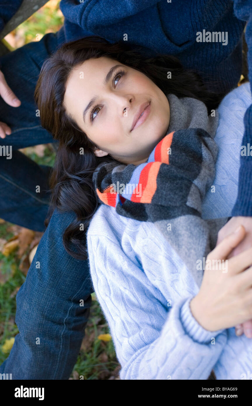 Girl resting head on man's lap Stock Photo - Alamy