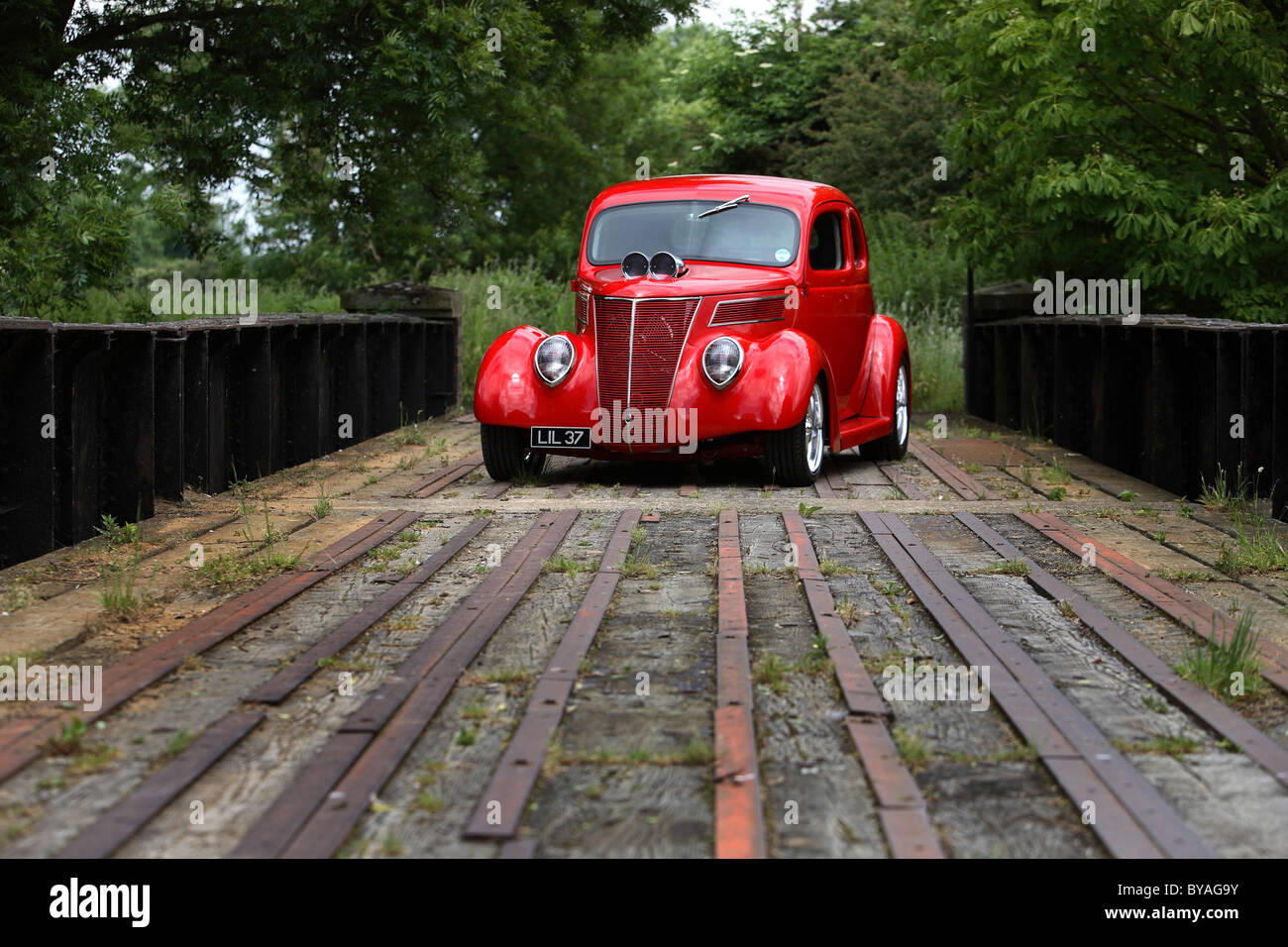 1937 Ford coupe red hot rod hotrod blown engine Stock Photo - Alamy