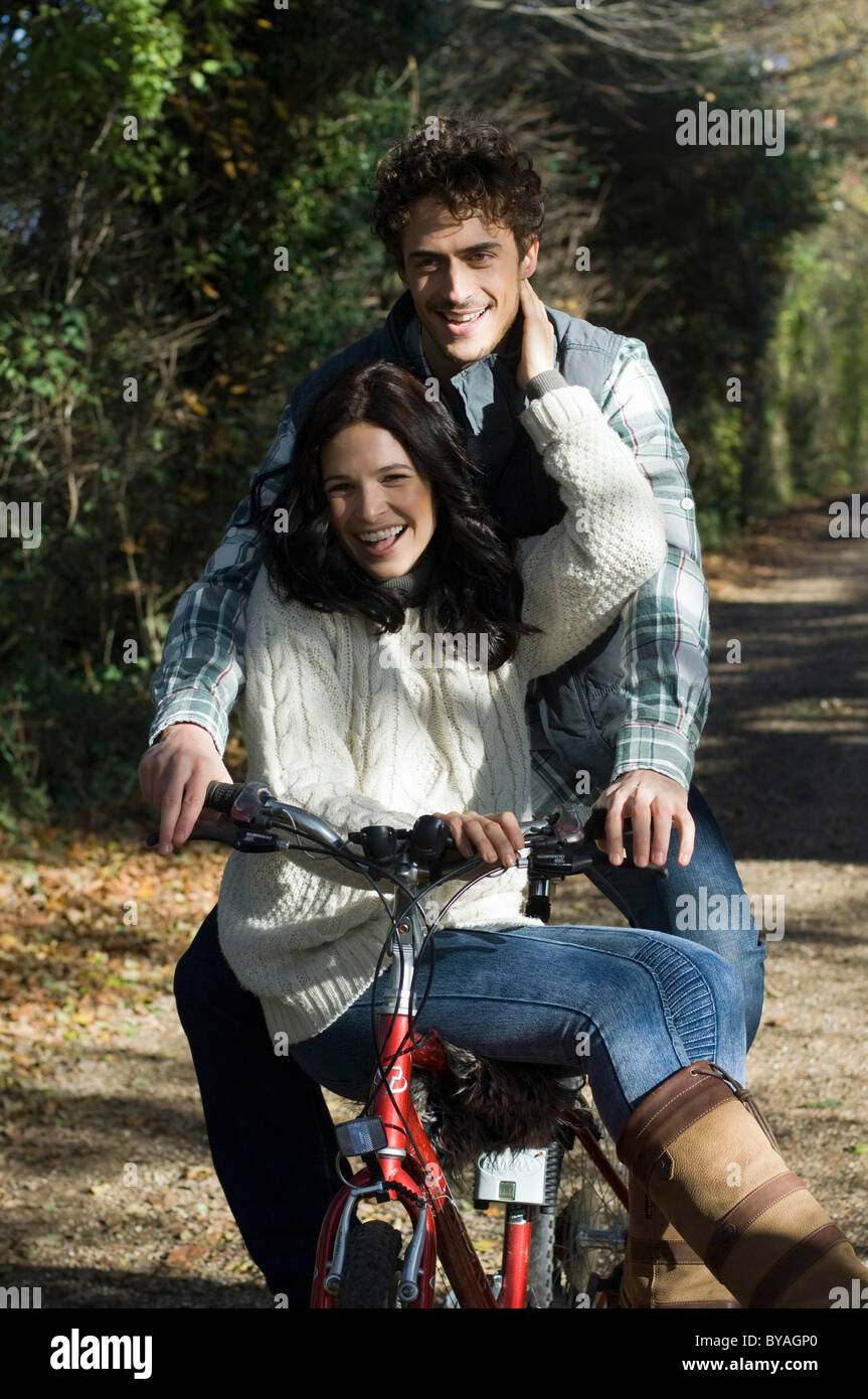 Couple on bicycle Stock Photo - Alamy