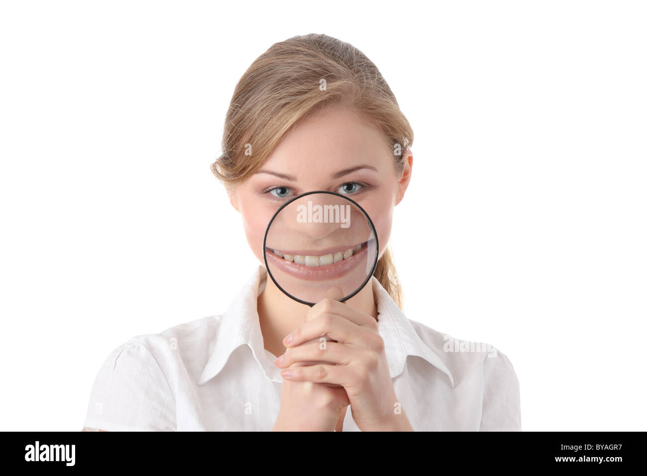The woman with a magnifier in a hand on the isolated background Stock ...