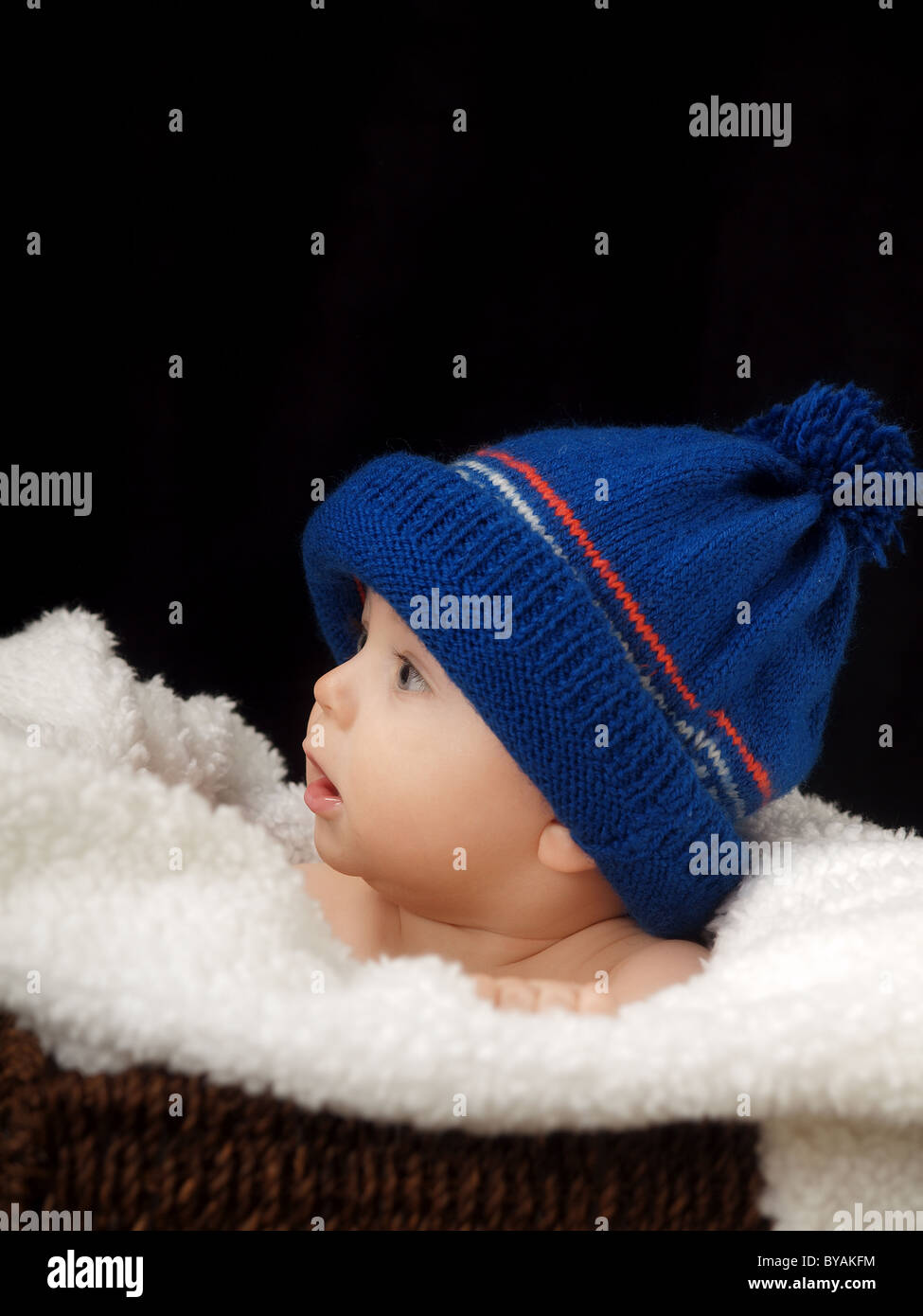 Baby with cap Stock Photo - Alamy