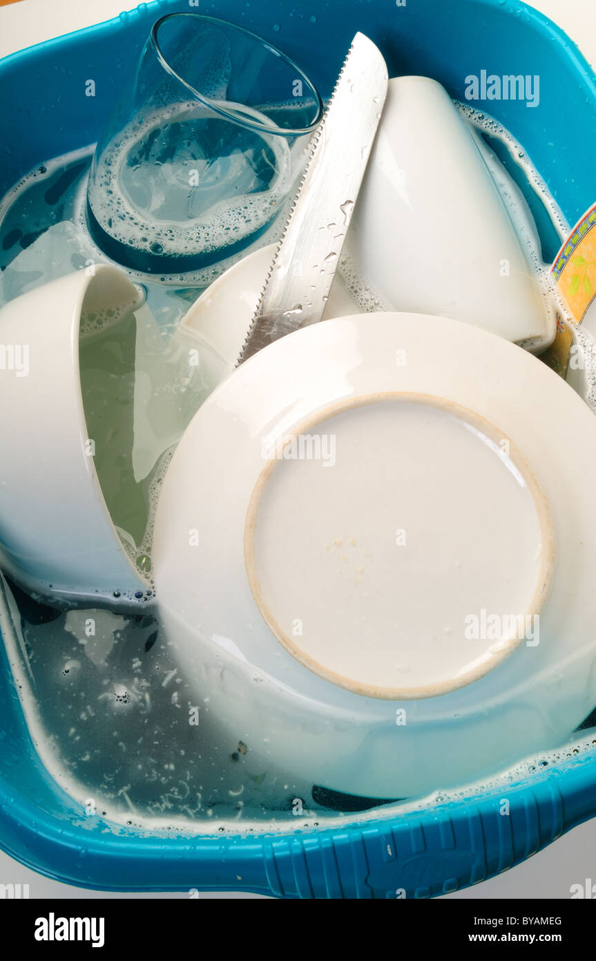 Washing Dishes in Bowl Stock Photo - Alamy
