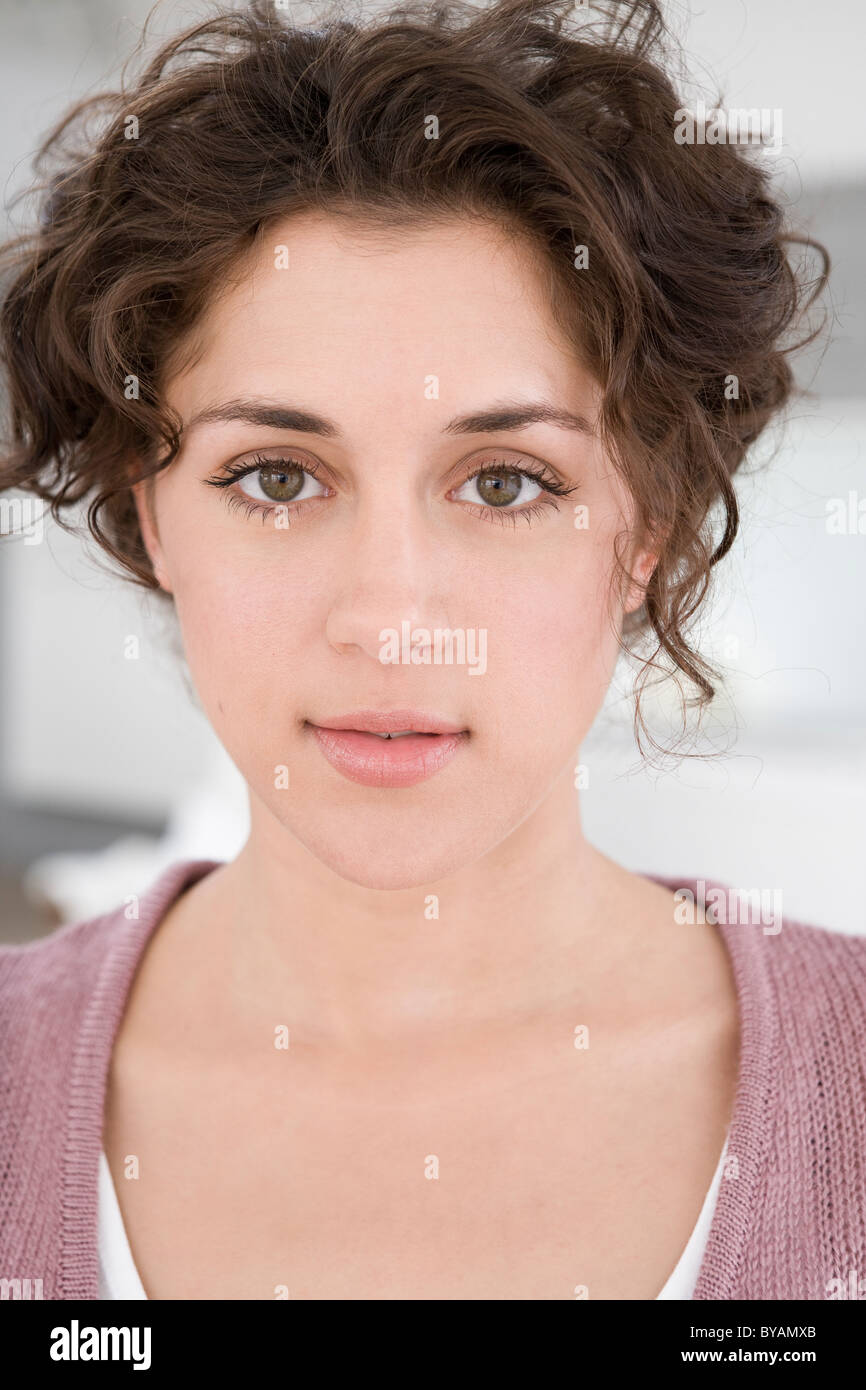 Woman looking into camera Stock Photo - Alamy