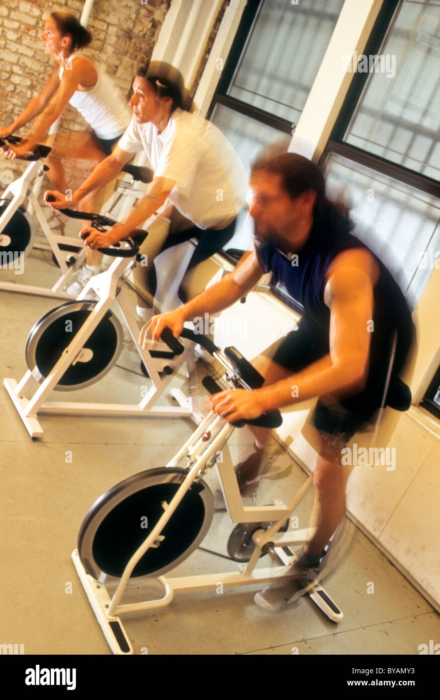 Cycling spinning class in action Stock Photo - Alamy