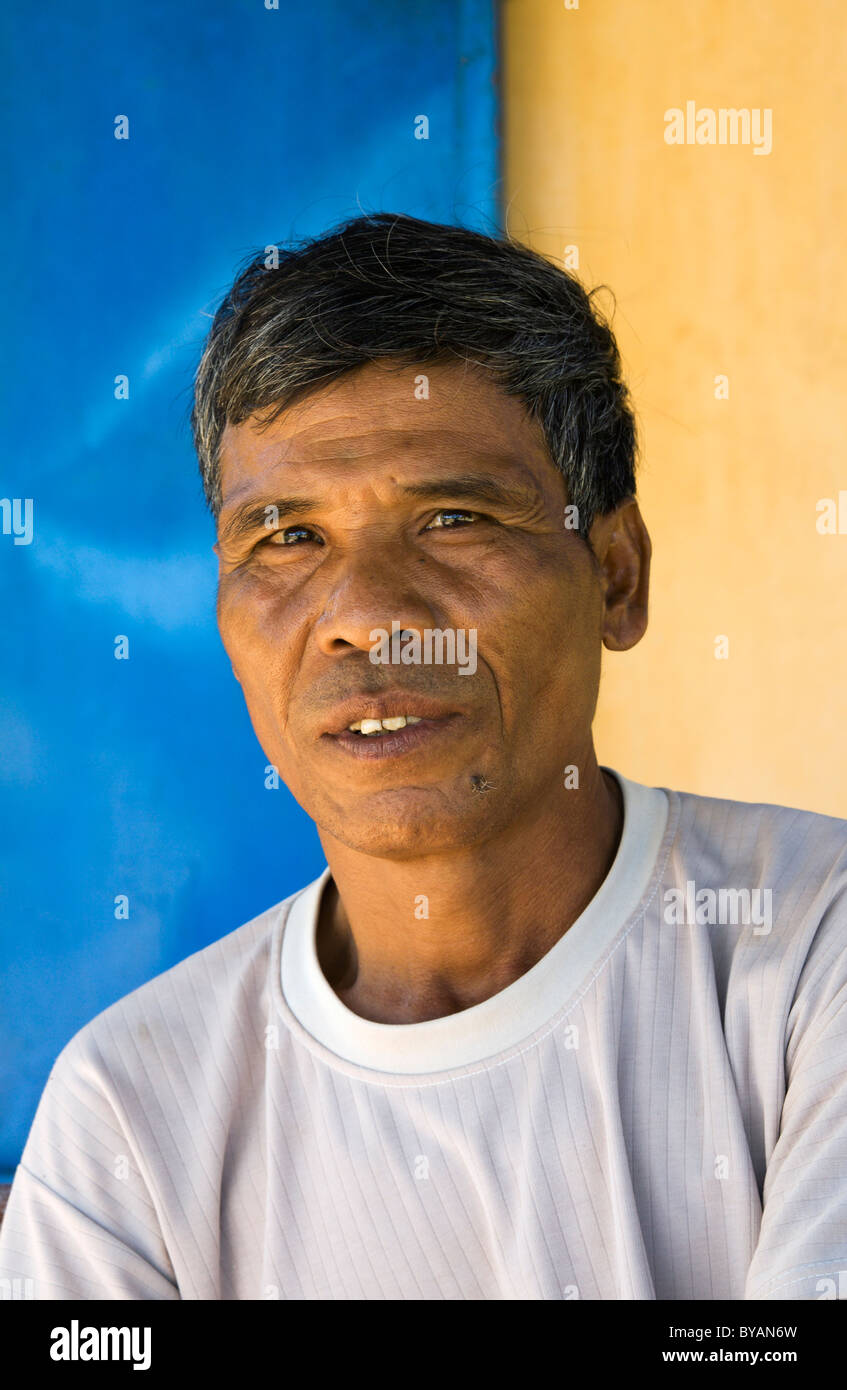 Portrait of a Cham man working as caretaker for Po Ro Me Cham Tower ...