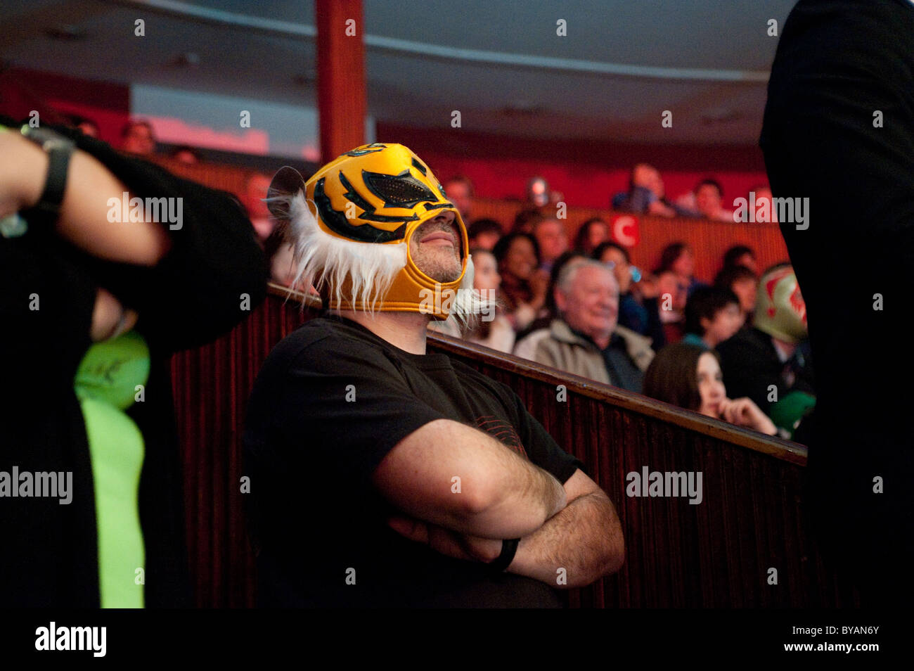 fan with mask during a Lucha Libre (mexican wrestling) watching a ...