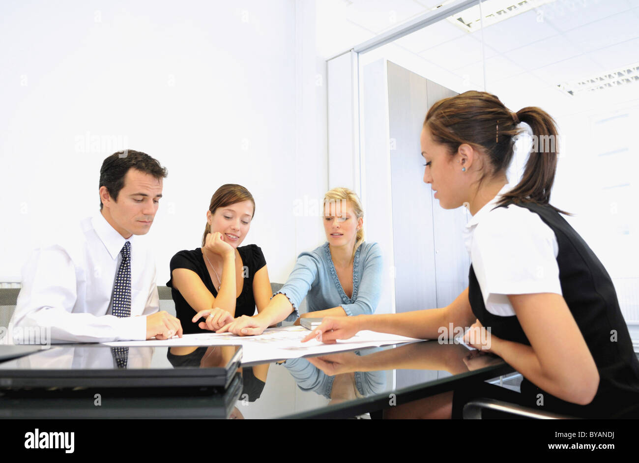 Business team look at plans Stock Photo - Alamy