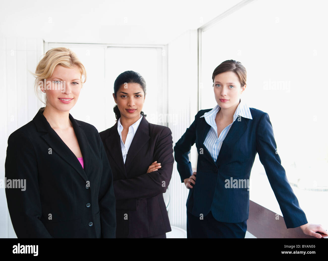 Three business women in office Stock Photo - Alamy
