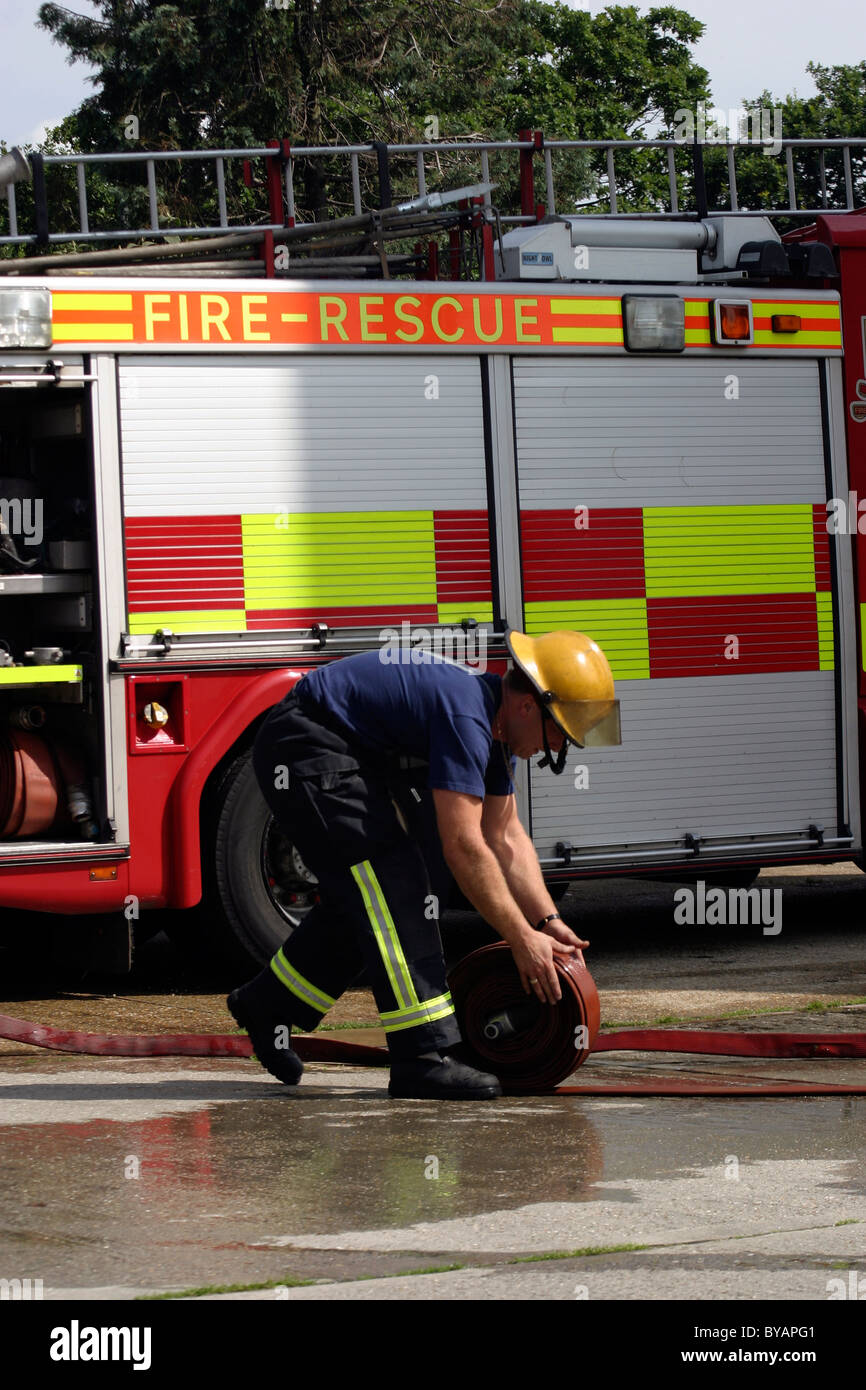 Rolling fire hose hi-res stock photography and images - Alamy