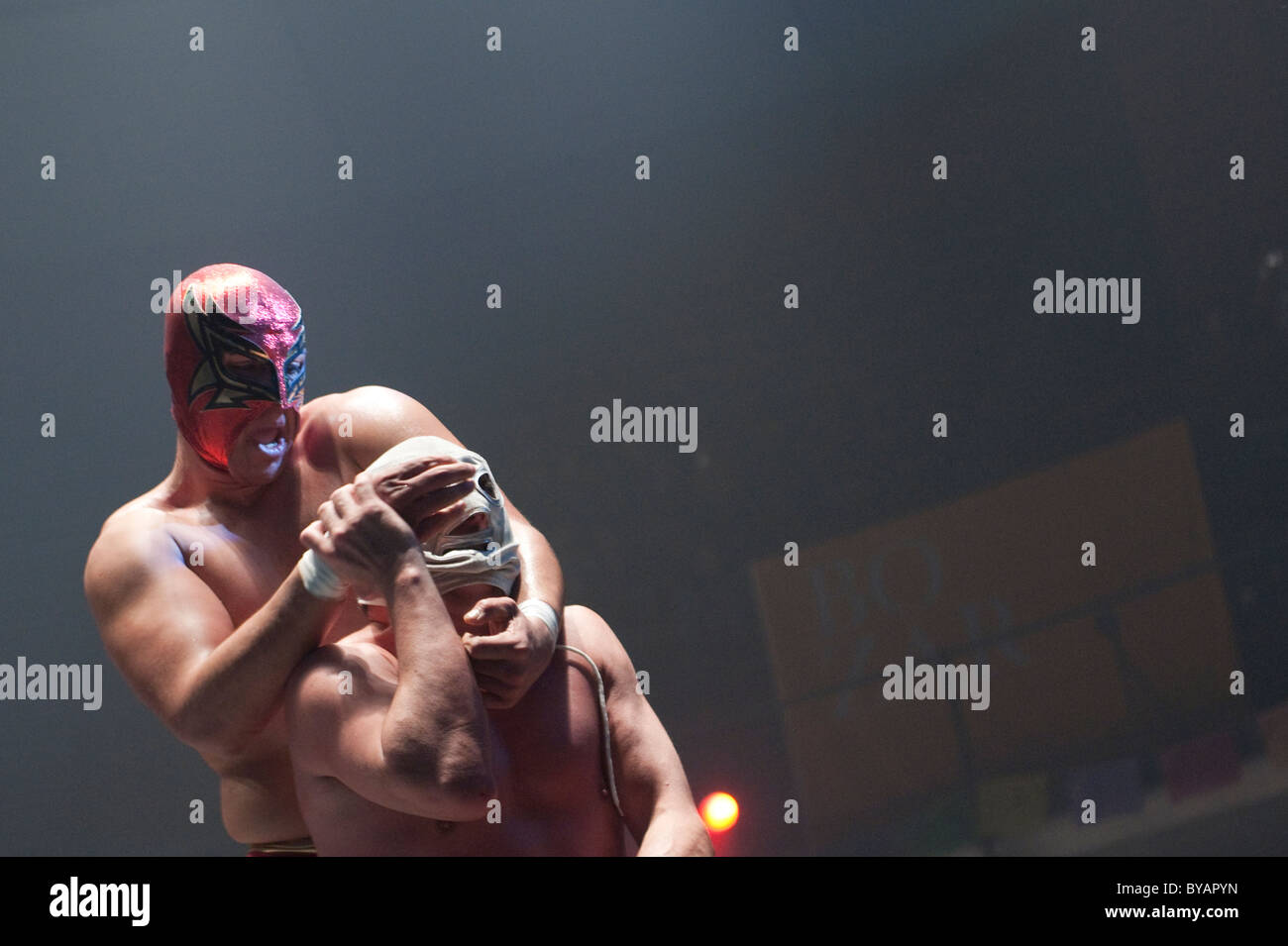 Luchador (Mexican wrestler) trying to unmask his opponent Stock Photo ...