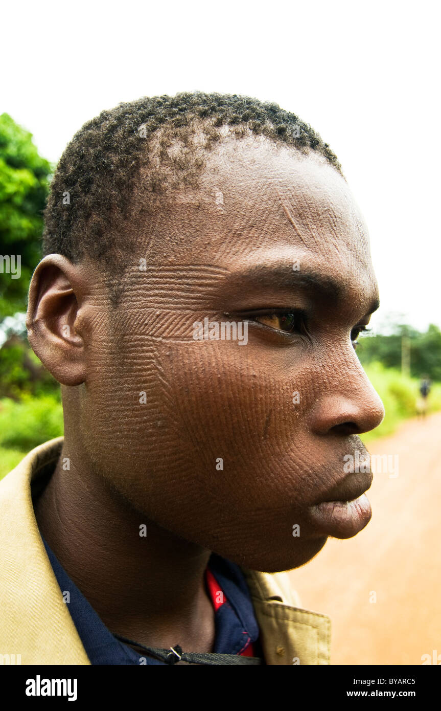 Portrait of a Somba man. his face is fully scarred as for the Somba ...