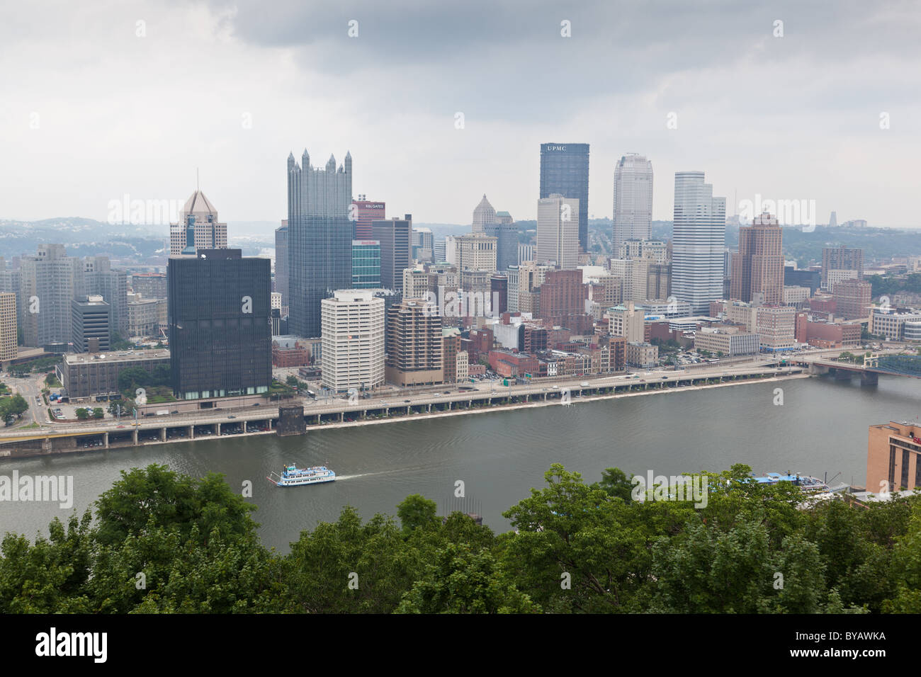 Downtown Pittsburgh, Pennsylvania, USA with boat on Monongahela river ...