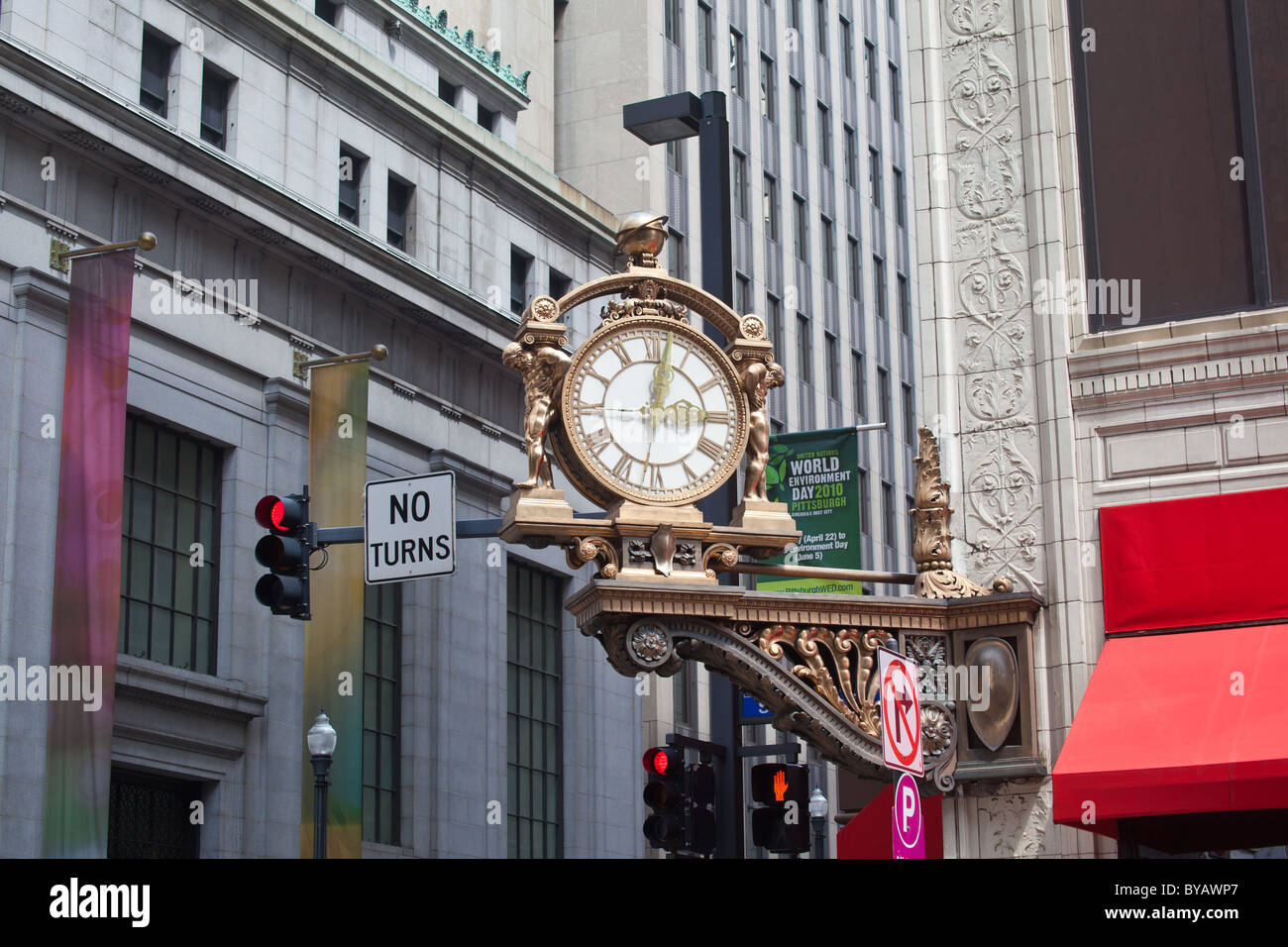 Decorative gold clock face at junction in downtown Pittsburgh ...