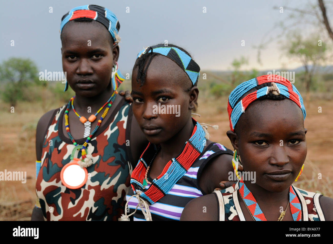 Young girls from the Hamar tribe in the initiation ritual "leap over ...