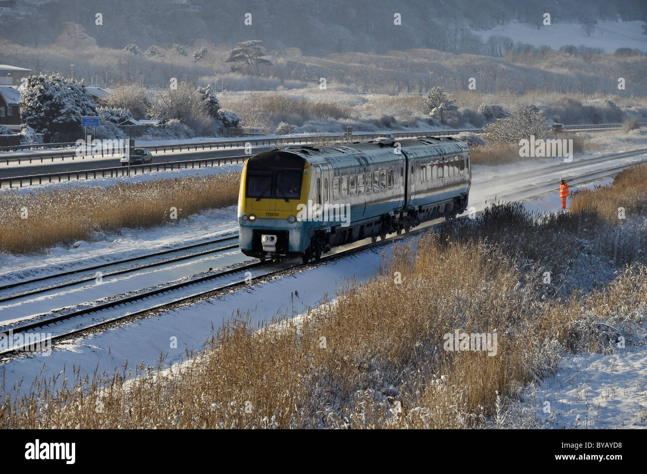 Railway line workers in winter track inspection Stock Photo - Alamy